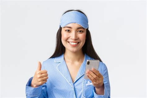Premium Photo Portrait Of A Smiling Young Woman Over White Background