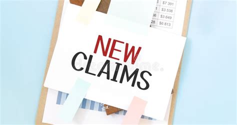 Paper Plate With Text NEW CLAIMS Diagram Notepad And Blue Background