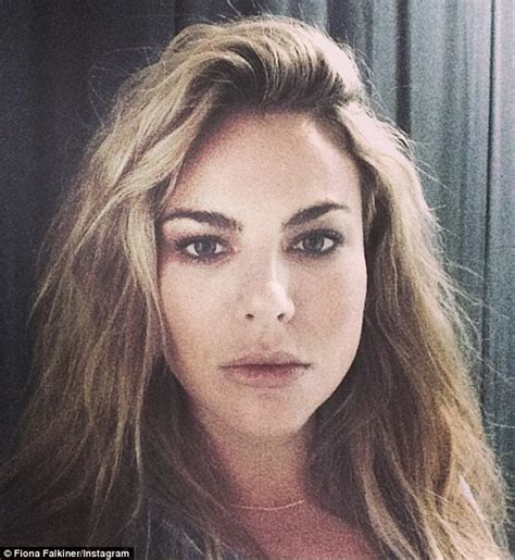 Fiona Falkiner Flashes Buxom Chest In Nothing But A White One Piece