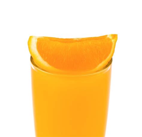 Jugo Y Rodajas De Naranja Foto Premium