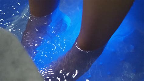 Foot Spa Woman Bare Feet Massaging In Soap Water Machine At Spa Shop
