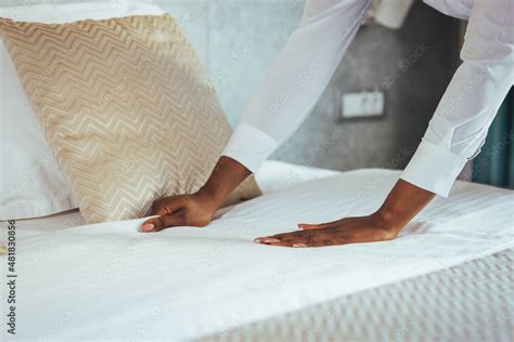 Housekeeper Cleaning A Hotel Room African Housekeeper In A Hotel Room