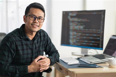 Premium Photo Software Develper Working On Laptop At Home Office Programmer Working Develop