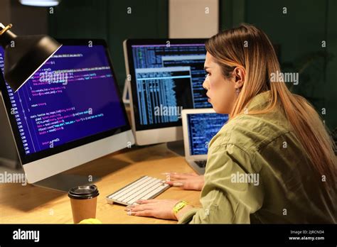 Transgender Programmer Working In Server Room Stock Photo Alamy