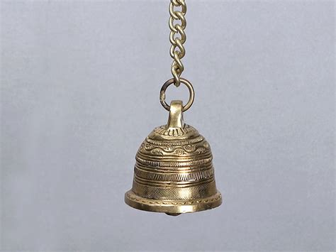 27 Brass Peacock Wall Bracket With Hanging Bell Exotic India Art