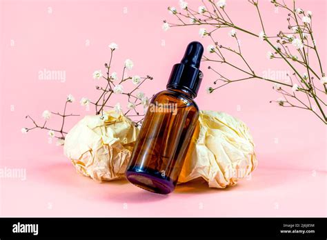 Brown Glass Bottle With Essential Oil And Dropper For Skin Care And