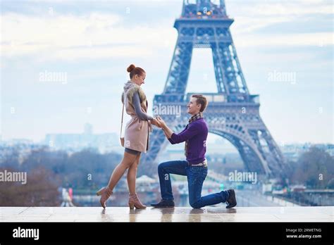 Romantic Engagement In Paris Man Proposing To His Beautiful Girlfriend