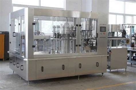 Rotary Bottle Filling Machine At 882000 Rinsing Filling And Capping