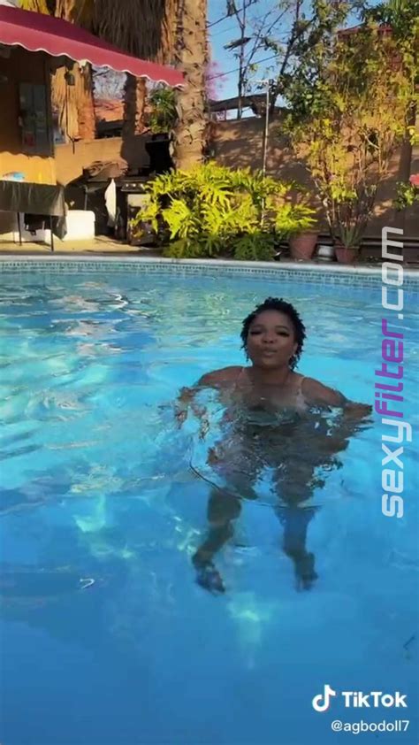 Sexy Agbodoll7 Shows Cleavage In Swimsuit At The Pool