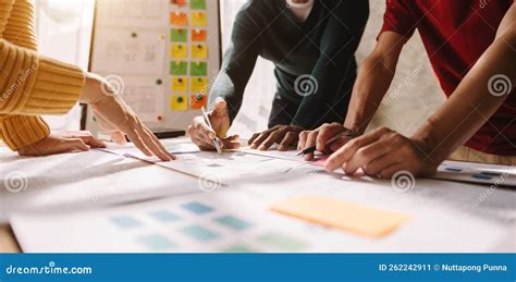 Ux Developer And Ui Designer Brainstorming About Mobile App Interface