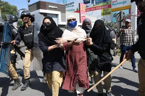 Pakistani Police Officers Intervene In Supporters Of Pti And Imran Khan