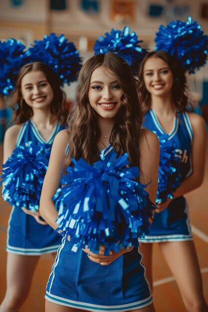 A Team Of Smiling Cheerleaders Posing For A Photo Premium Ai