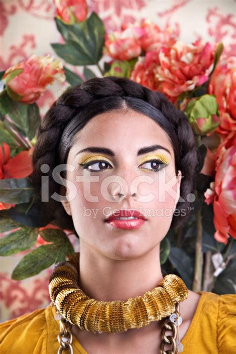 Mexican Girl With Flowers In Her Hair