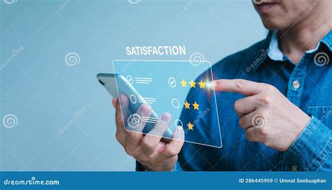 A Man Points With His Finger And Selects A Five Star Emoji To Display