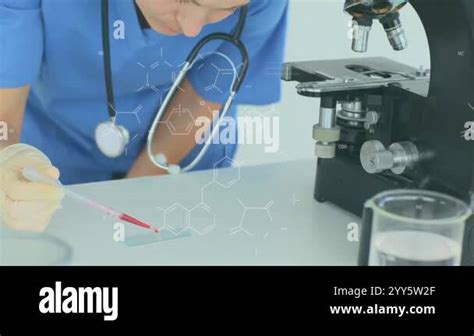 Examining Sample Under Microscope Scientist Viewing Chemical