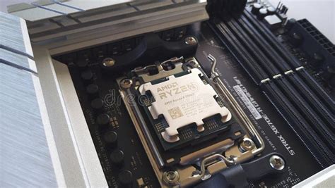 Close Up Of An Amd Ryzen 9 7900x Processor Installed On A Motherboard