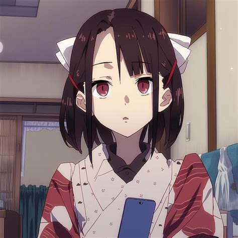 Anime Girl With Cat Ears Holding A Cell Phone In Her Hands Generative