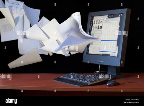 Papers Being Sucked Into A Flat Screen Computer Monitor Indicates Stock Photo 13575893 Alamy