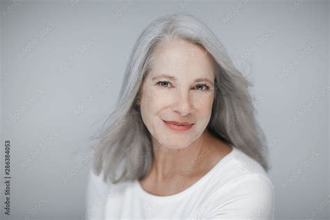 Stunning Beautiful And Self Confident Best Aged Woman With Grey Hair Smiling Into Camera Stock
