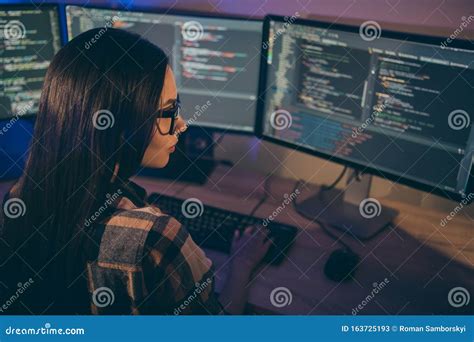Photo Of Serious Confident Focused Girl Concentrated On Hacking The