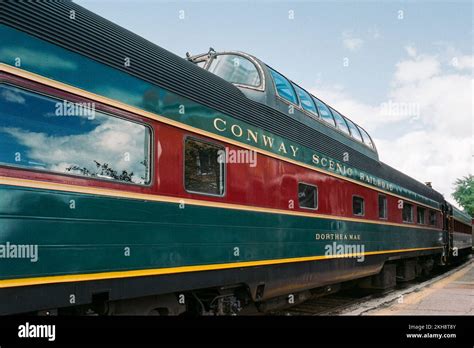 Green Red And Gold Double Decker Passenger Car Waiting For Passengers
