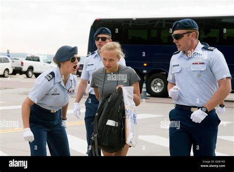 A First Class Cadet Yells Orders At A Newly Arrived Incoming Freshman