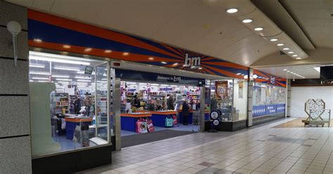 Snaking Queues And Trolley Loads Of Bargains As Shoppers Strip