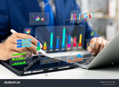 92 Businessman Utilizing Data Analytics Analyze Financial Business Data Graph Royalty Free