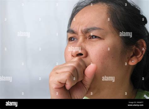 Illness Young Woman Coughing At Home Sick Woman Coughing On Her Hands