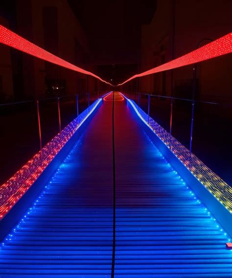 Premium Photo Photo Of A Vibrant Neonlit Walkway Shining In The Dark