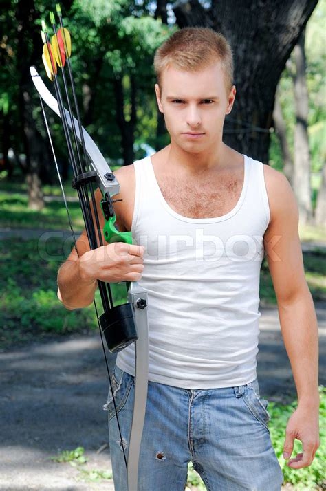Babe Man With A Bow And Arrows In The Woods Stock Image Colourbox