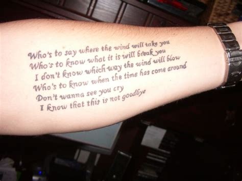 A Person S Arm With A Poem Written On The Back Of It Which Reads What
