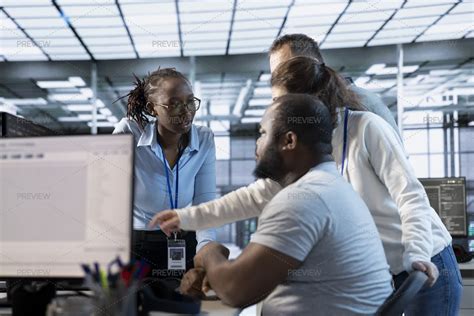 System Admins Brainstorming In Computer Network Security Data Center