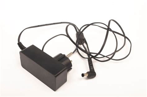 Premium Photo Laptop Adapter Isolated On White Background