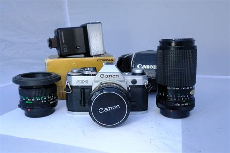 Canon Ae 1 Canon Fd 28mm F 2 8 50mm F 1 8 70 210mm Catawiki