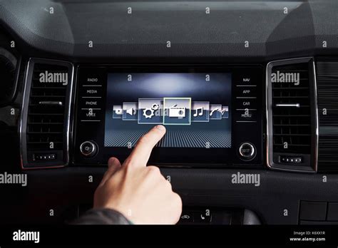 Smart Car And Internet Of Things IOT Concept Finger Point To Car S Console And Icons Popup Out