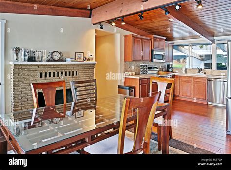 Table And Chairs In Rustic Kitchen Stock Photo Alamy