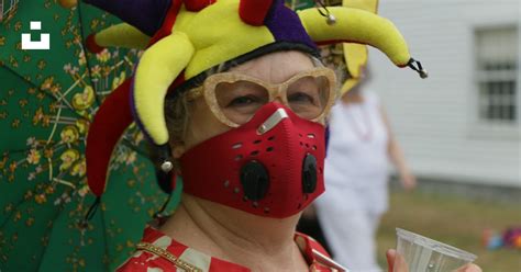 Person In Red Yellow Green And Blue Clown Costume Photo Free Colorful