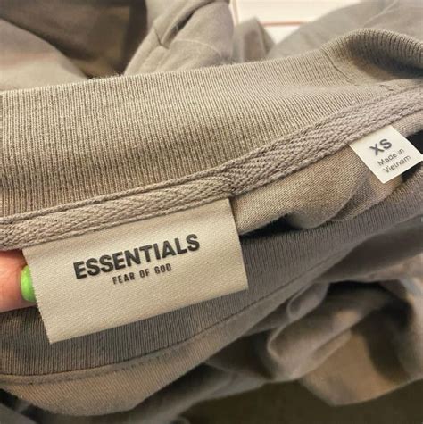 July 2022 Convincing Fake Essentials Sweatshirt Logo Tag Looks Kosher