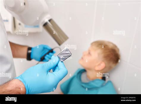 The Sensor Is Individually Packaged Close Up Radiographer Taking