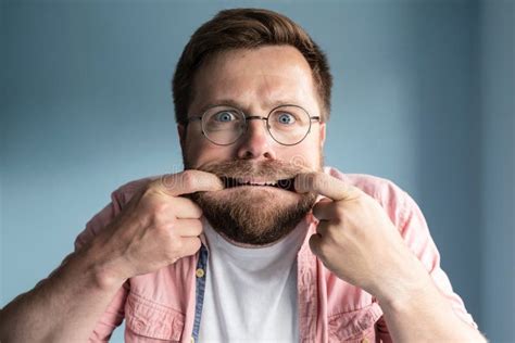 Strange Man Made A Grimace He Put Fingers Into Mouth Stretching It By