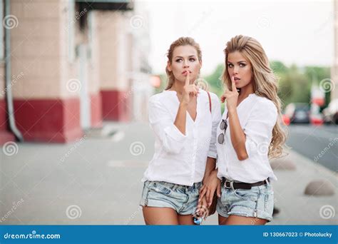 Beautiful Women Twins Showing Peace And Emotionally Posing Stock Image Image Of Shirt