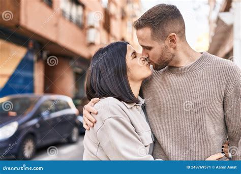 Man And Woman Couple Hugging Each Other Kissing At Street Stock Image