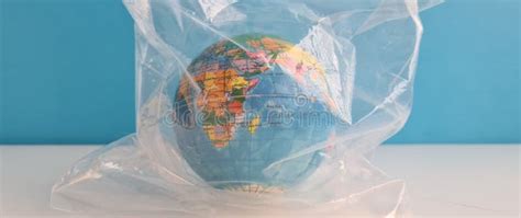 Planet Earth In Plastic Bag Environmental Problem Greenhouse Effect And
