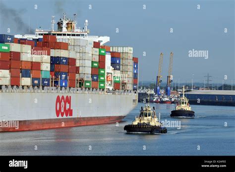 A Large Container Ship At The Southampton Container Terminal Being