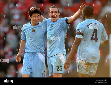 Manchester Citys Richard Dunne Centre Sun Jihai Left And Nedum