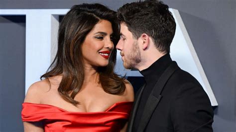 Nick Jonas Fixing Priyanka Chopras Ponytail Becomes Internets