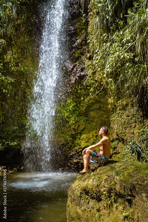 Young Men Posing At Toraille Waterfall St Lucia Saint Lucia Jungle