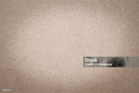 파티클보드 중간 밀도 섬유판의 거친 질감이 있는 마분지 배경 입자 프레스 나무 패널 또는 밝은 베이지색 갈색 크림 세피아 색상의
