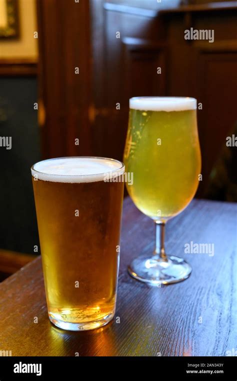 Misty Glasses With Two Pints Of Cold Scotch Ale Amber Pale Ale Lager